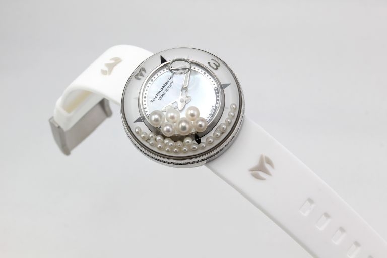 TechnoMarine timepiece features 28 pearls in a dome